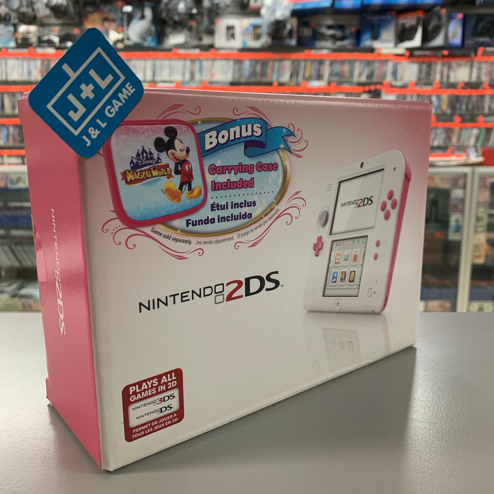 Nintendo 2DS Console (Peach Pink with Disney Magical World Carrying Ca ...